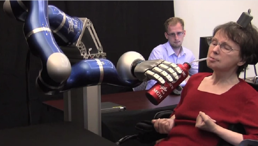 Paralyzed woman controls robotic arm, sips coffee - Ars Technica