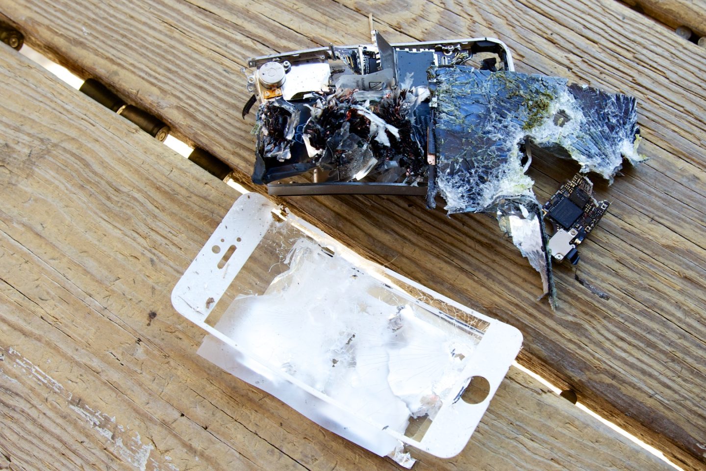 We test a "bulletproof" iPhone screen protector. With a gun. And ...