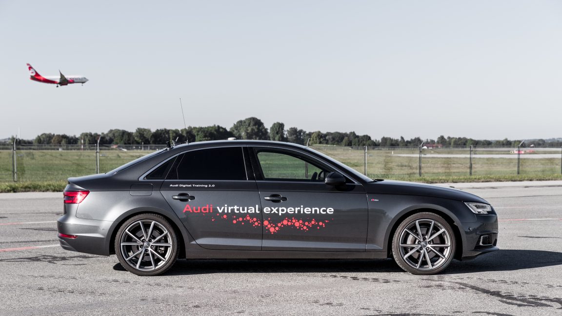VR goggles and giant touchscreen tables: How Audi explains new car ...