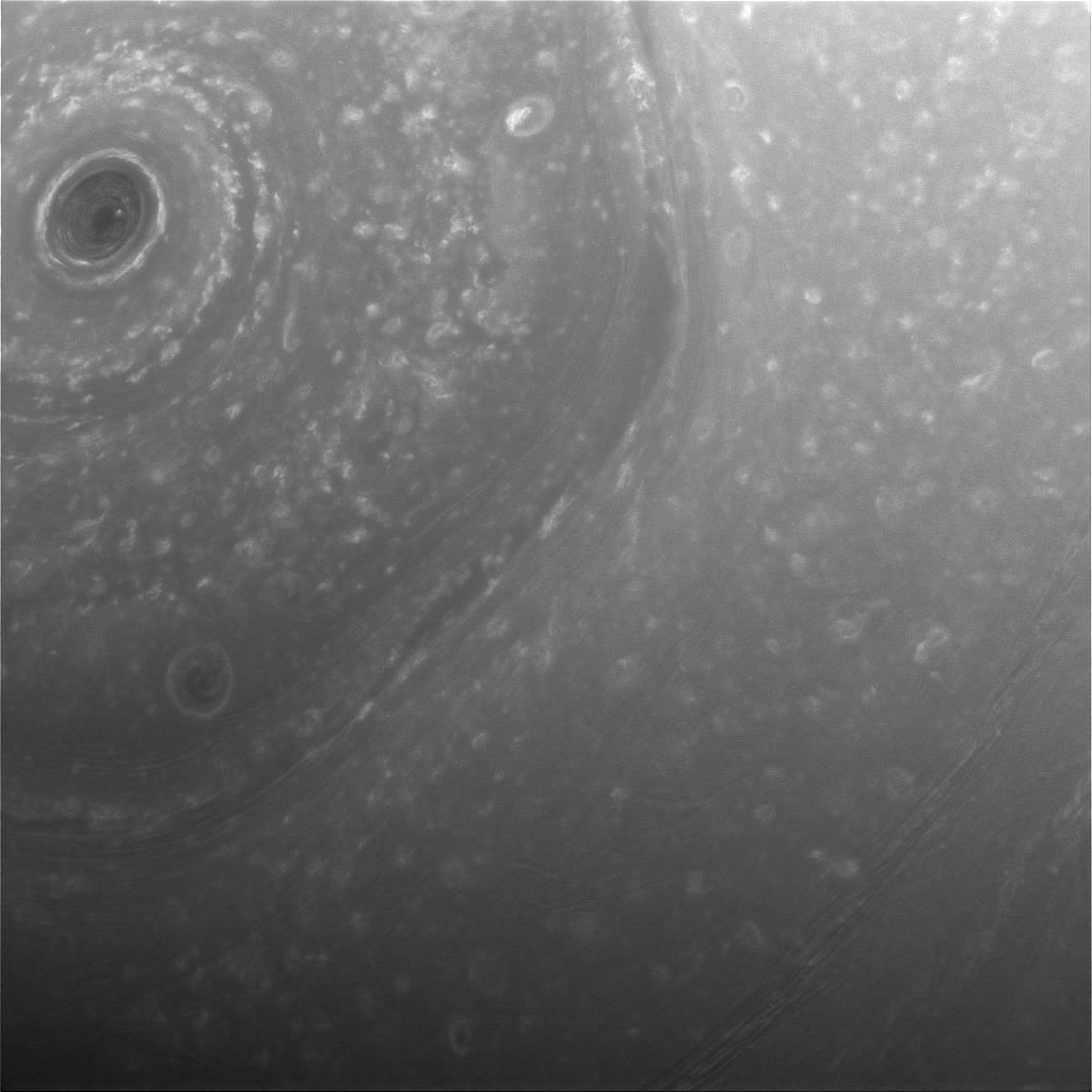 From high above Saturn, Cassini spies an odd, hexagon-shaped storm ...