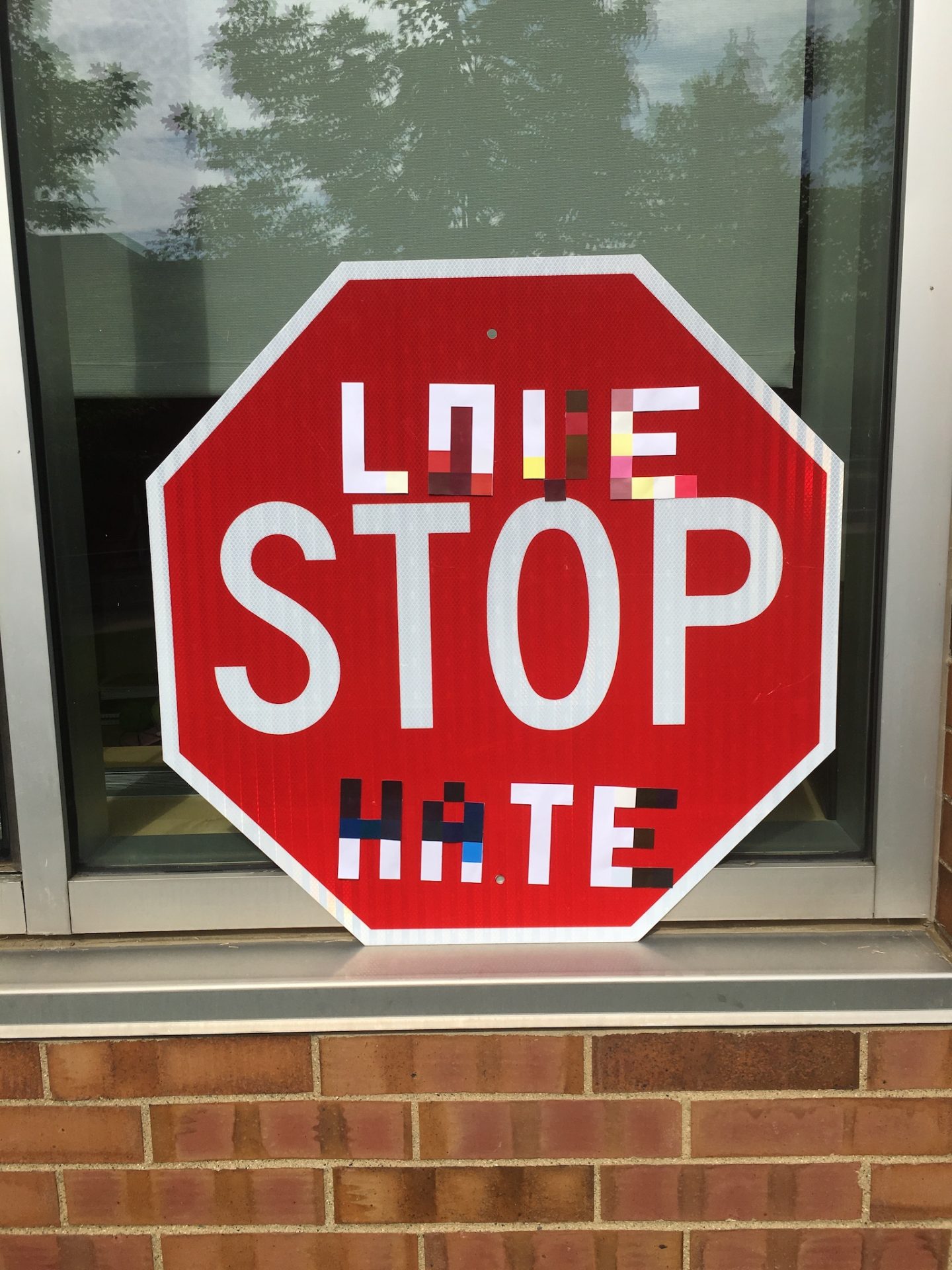 Hacking street signs with stickers could confuse self-driving cars ...