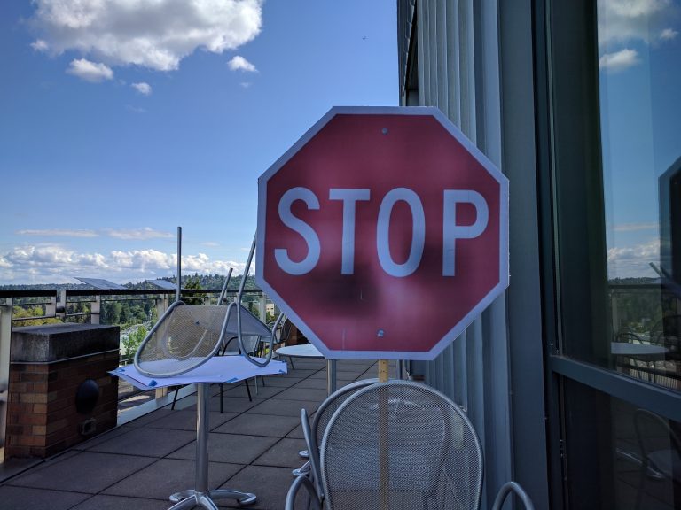 Hacking street signs with stickers could confuse self-driving cars ...