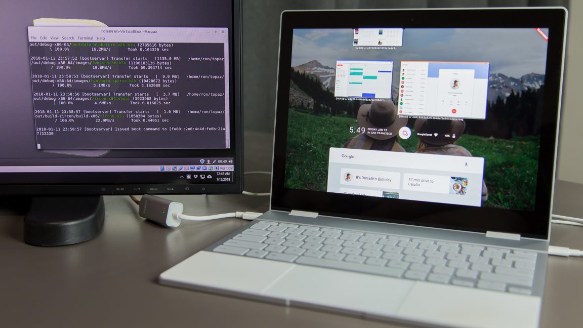 An external monitor sits next to a laptop computer.
