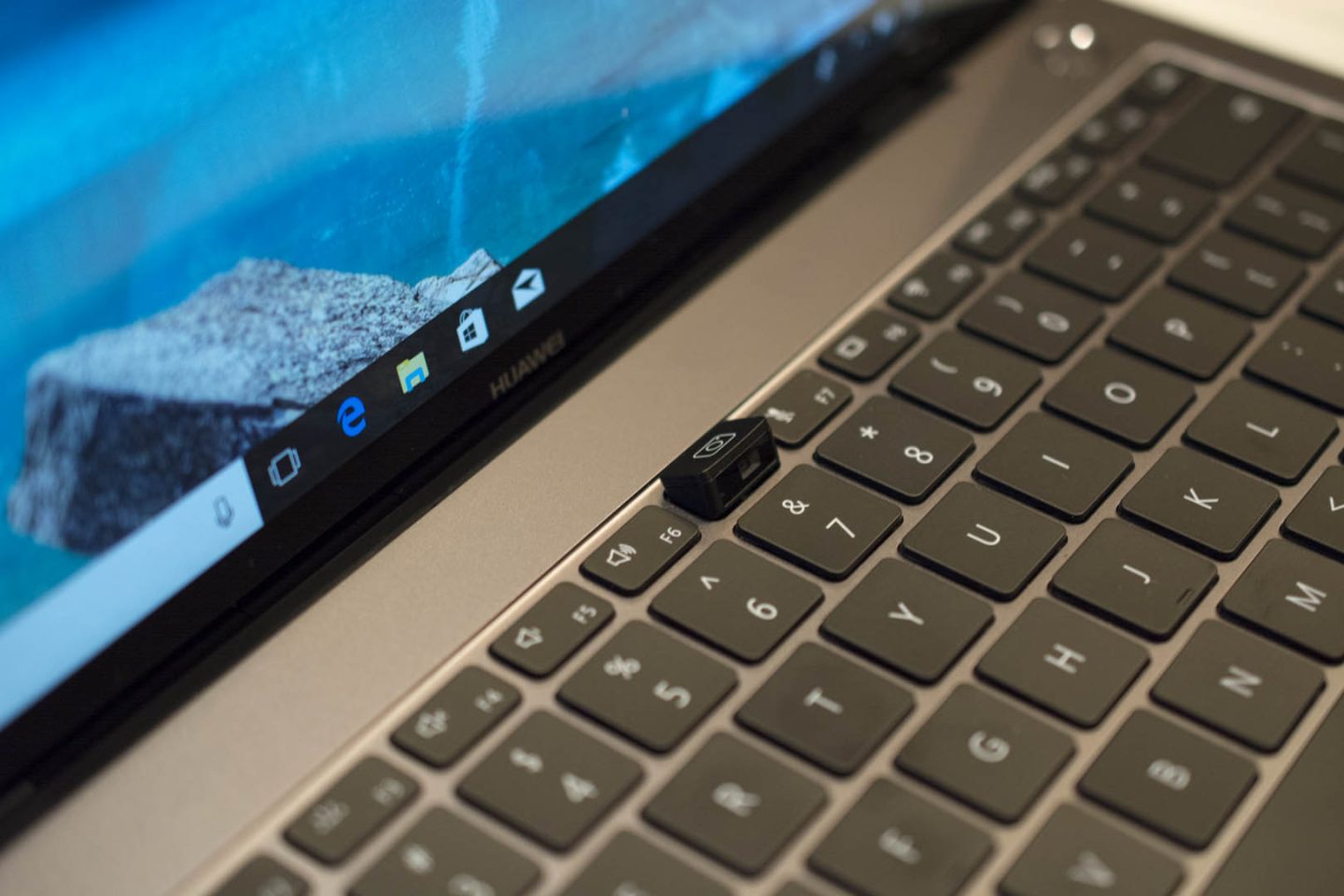 Huawei’s answer to laptop privacy: A keyboard with a pop-up webcam ...