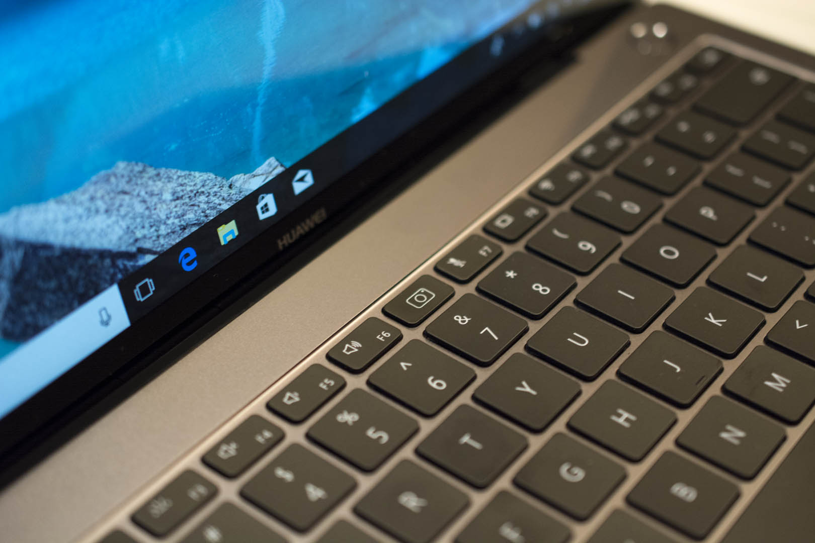 Huawei’s answer to laptop privacy: A keyboard with a pop-up webcam ...