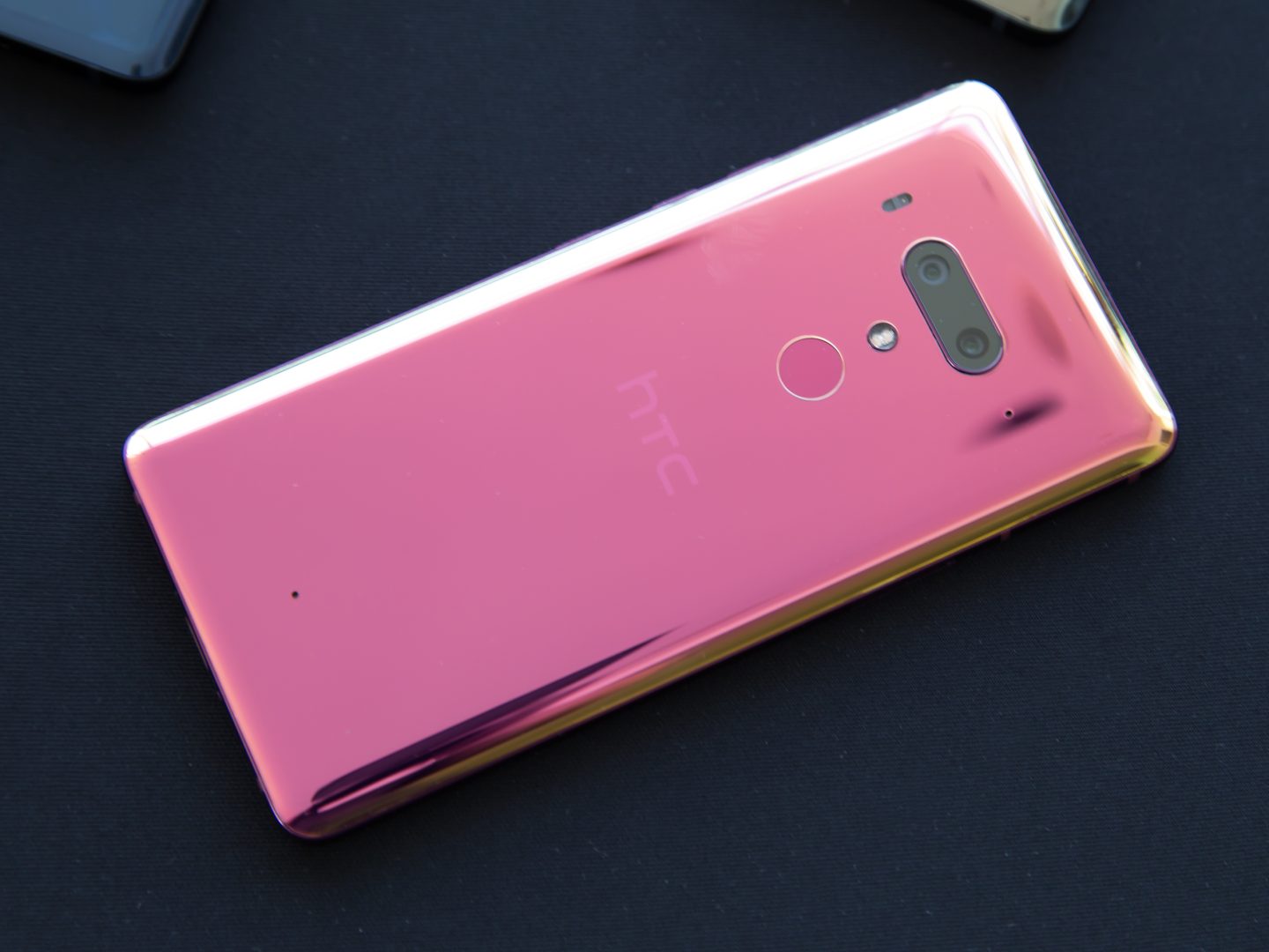 HTC’s new flagship smartphone has a translucent back, dual front ...