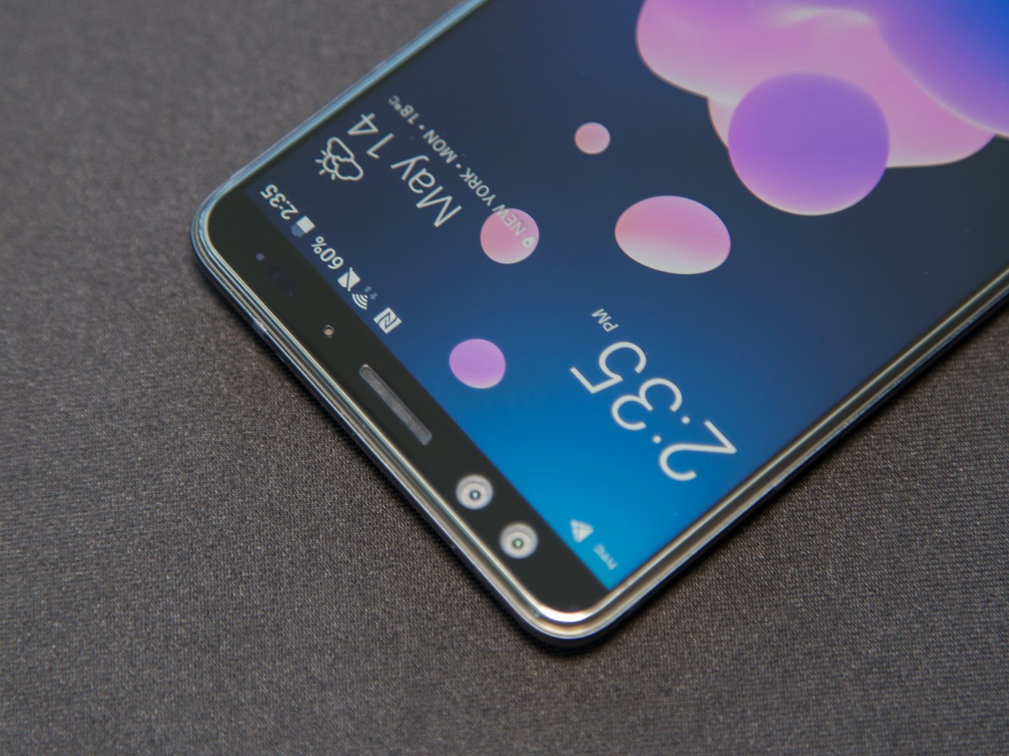 HTC’s new flagship smartphone has a translucent back, dual front ...