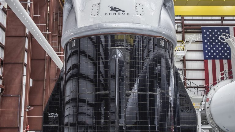 Dragon shows off its new, integrated solar arrays as SpaceX nears first ...