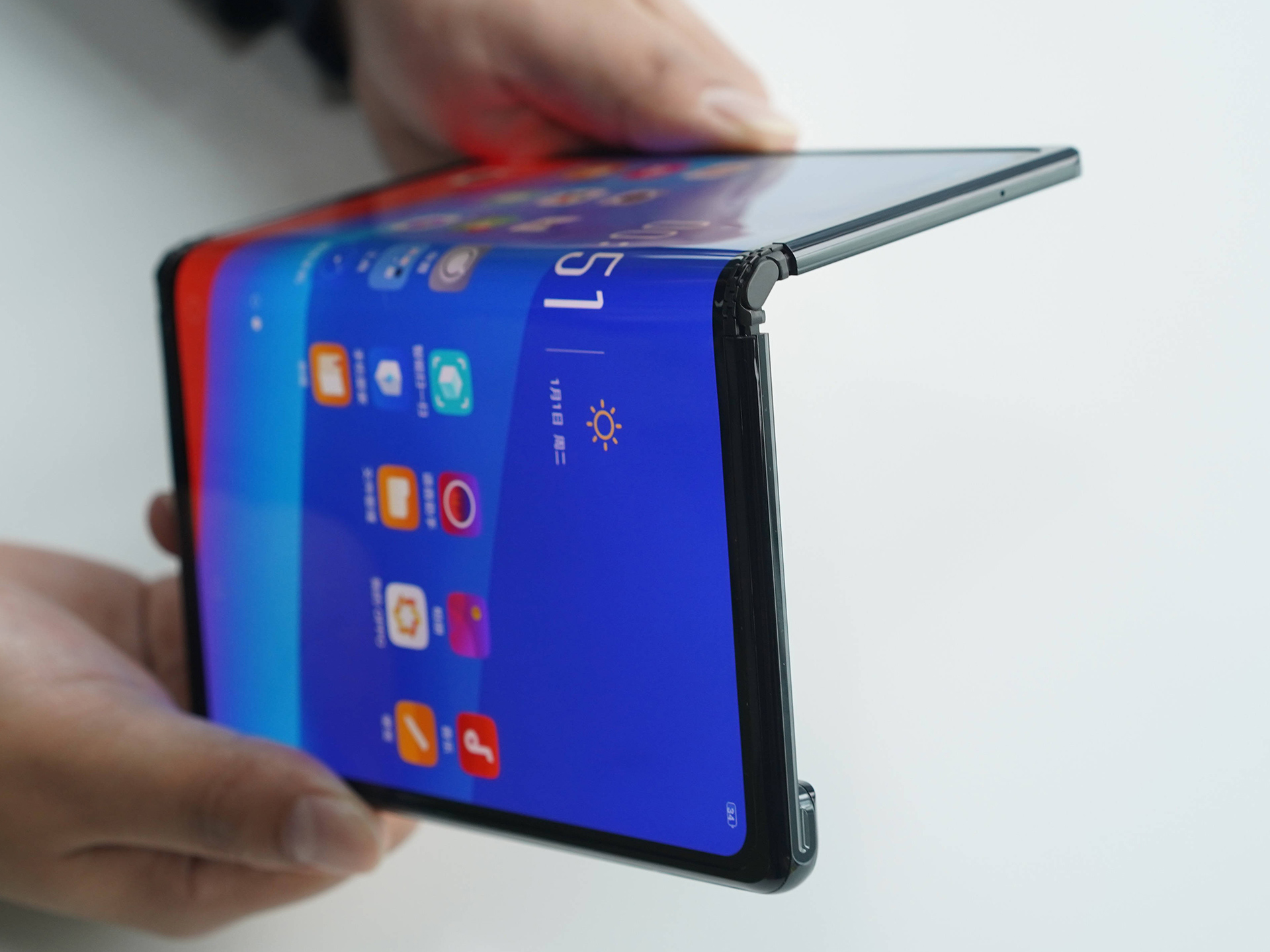 Oppo’s foldable smartphone is another futuristic wraparound display ...