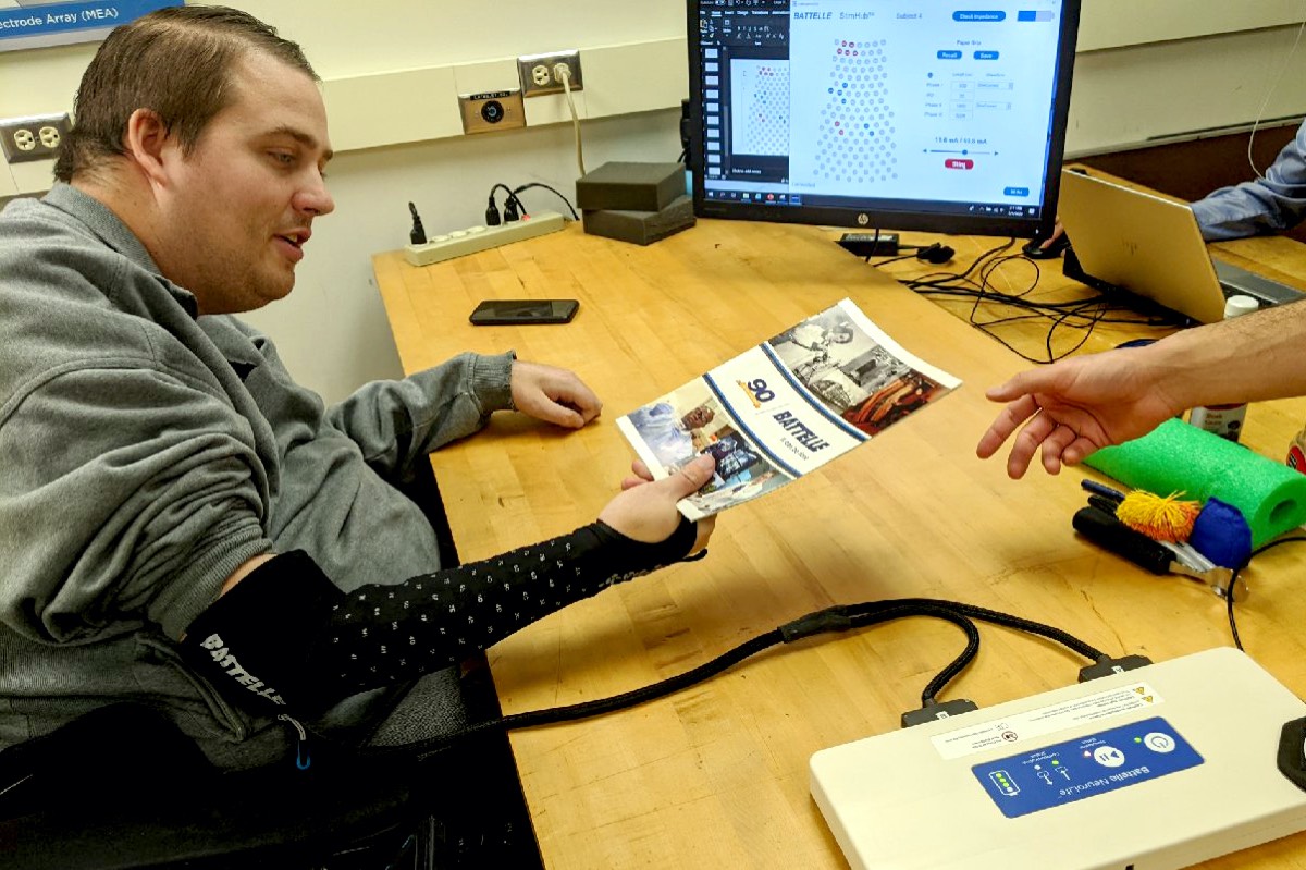 BCI system gives paralyzed man back his sense of touch with haptic ...