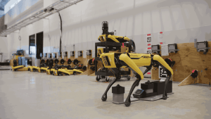 Boston Dynamics’ robot dog gets an arm attachment, self-charging ...