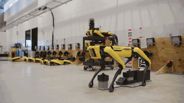 Boston Dynamics’ robot dog gets an arm attachment, self-charging ...
