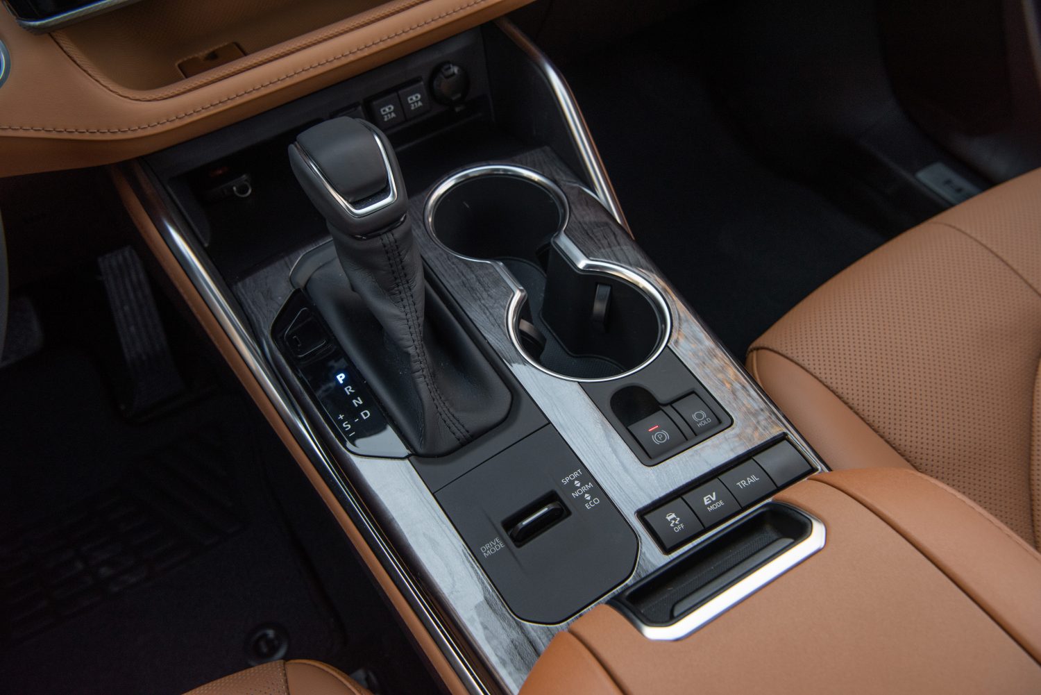 The Toyota Highlander hybrid is a big three-row with a buzzy engine ...