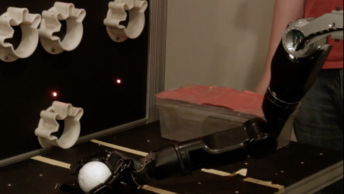 Brain implant gives robotic arm a sense of touch - Ars Technica