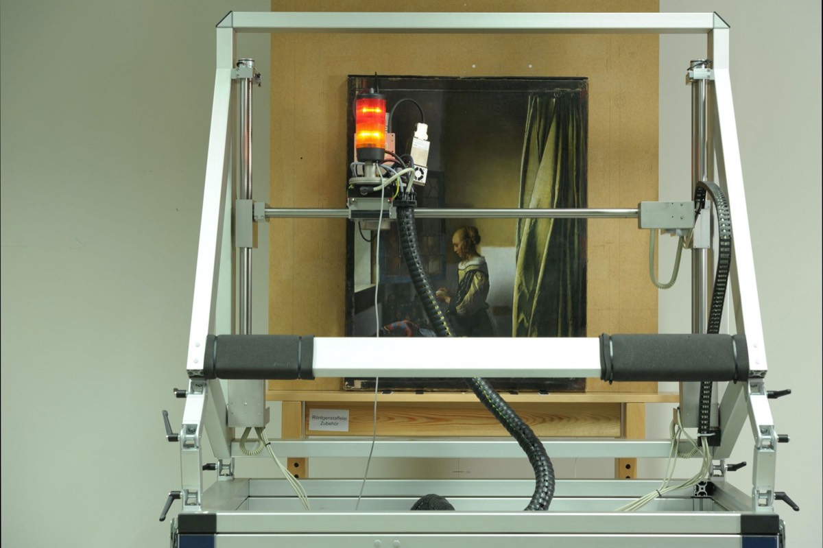 Restored Vermeer painting finally reveals hidden Cupid in background ...