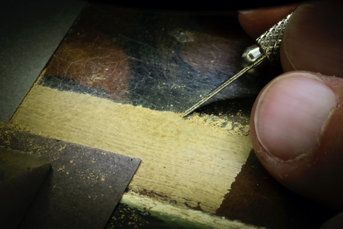 Restored Vermeer painting finally reveals hidden Cupid in background ...