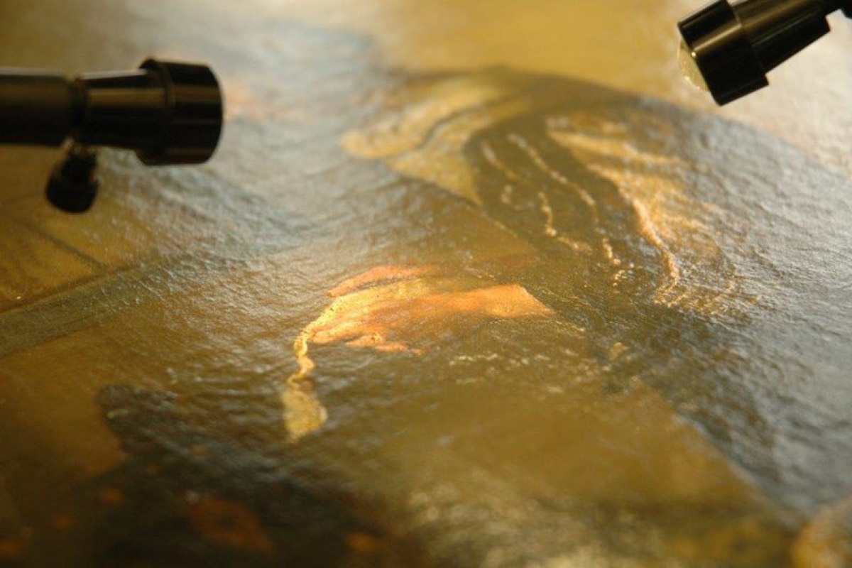 Restored Vermeer painting finally reveals hidden Cupid in background ...