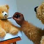Still image from an AI-generated video of a teddy bear painting a portrait.