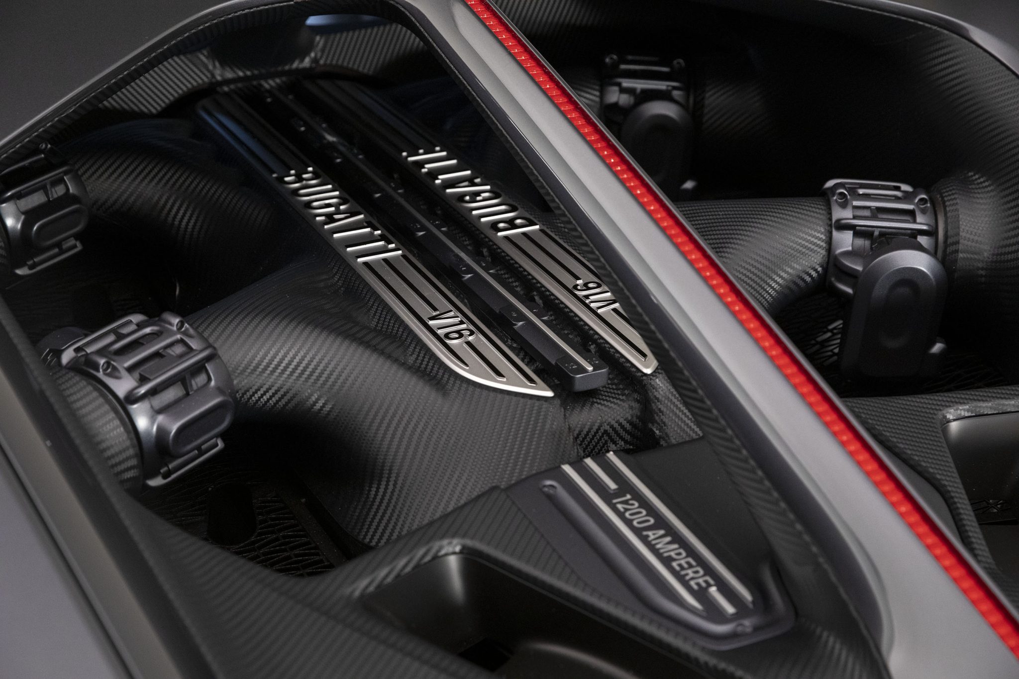 Bugatti’s new hypercar loses the turbos for a screaming V16 hybrid ...