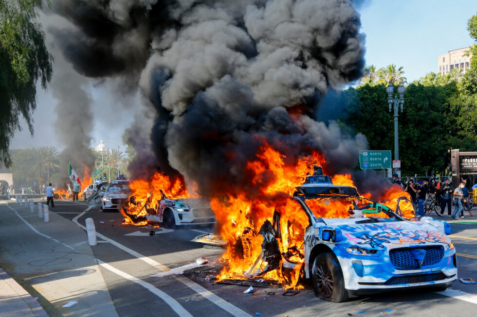 Protesters burn Waymo robotaxis in Los Angeles after ICE raids - Ars ...