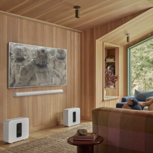 A couple uses Sonos' Arc Ultra soundbar and Sub 4 subwoofer.