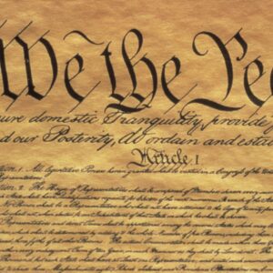 A picture of the opening passage of the US Constitution, beginning "We the people"