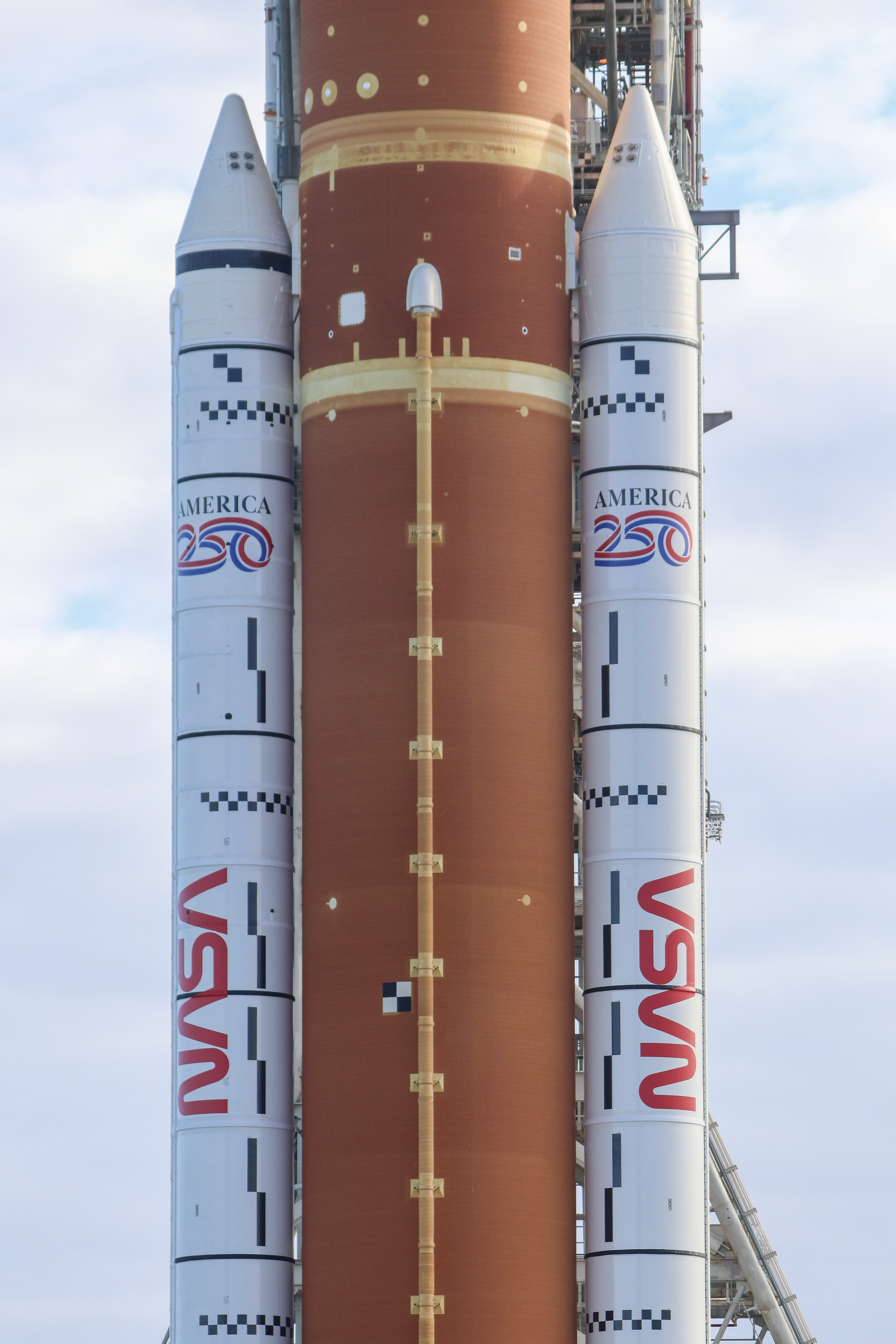 NASA’s Artemis II rocket rolls to launch pad, but key test looms ahead ...